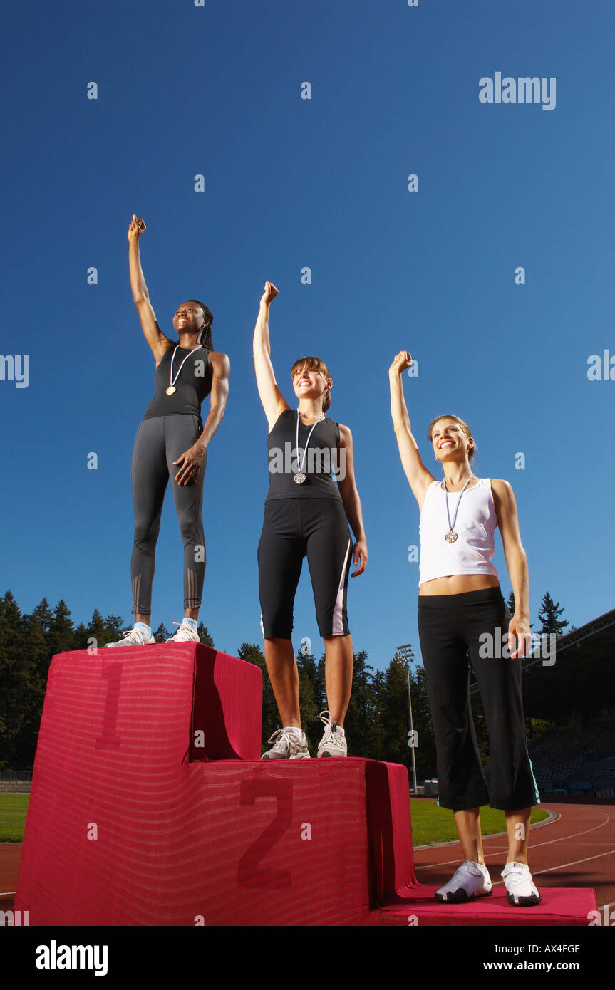 Standing in winner posture hi-res stock photography and images - Alamy
