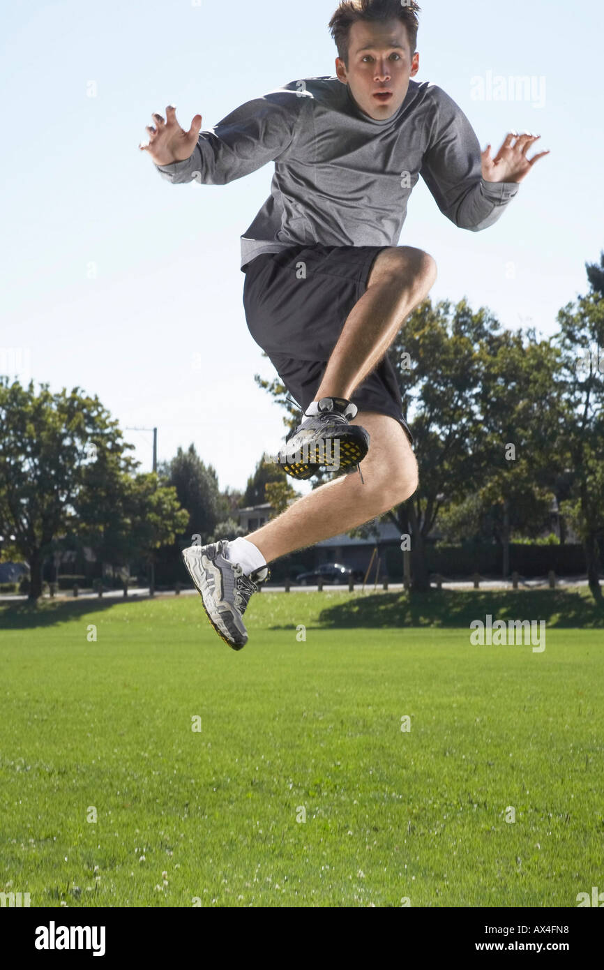 Man running arms in the air hi-res stock photography and images - Alamy