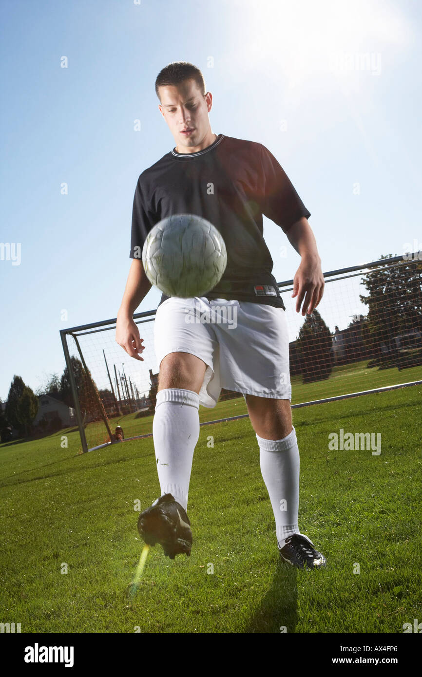 Man Playing Soccer Stock Photo - Alamy