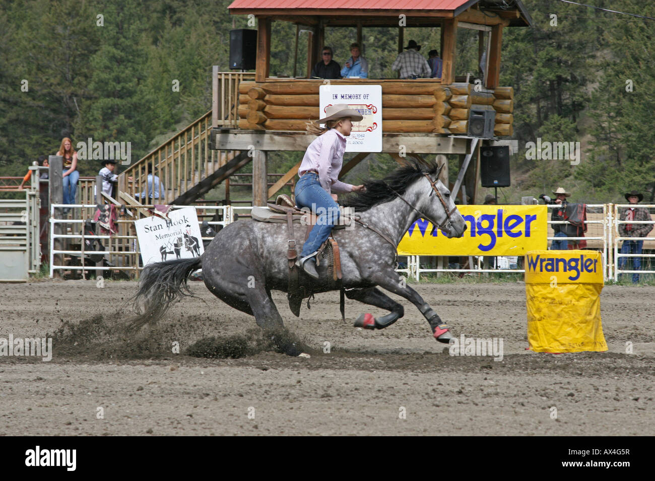 Barrel racing at a rodeo Stock Photo - Alamy