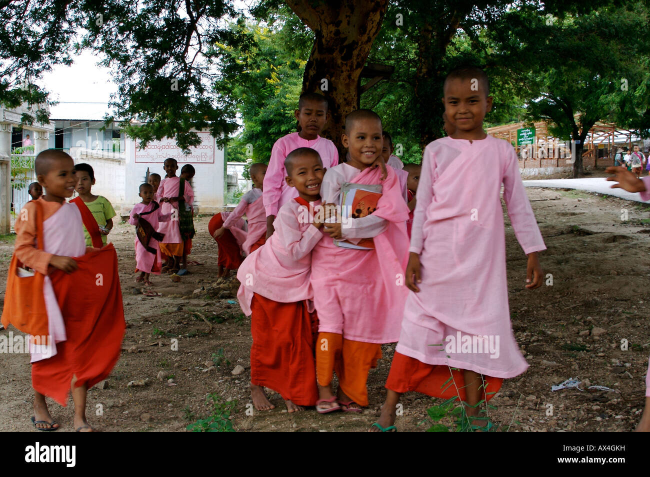 Young nuns playing outsite Sagaing Monastery Stock Photo - Alamy