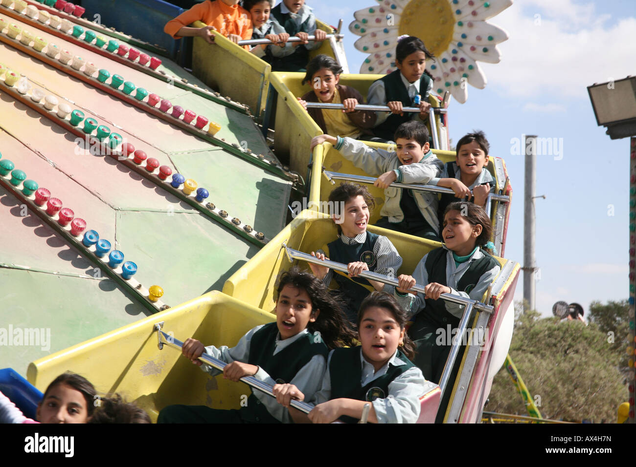 children playing at fair in Amman, jordan Stock Photo - Alamy