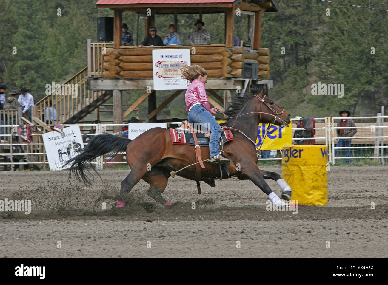 Barrel racing at a rodeo Stock Photo - Alamy