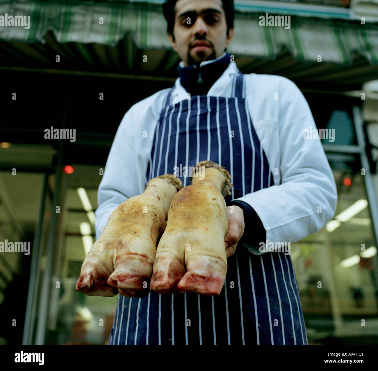 Halal butcher with cow hoofs on Harrow Road, West London Stock Photo ...