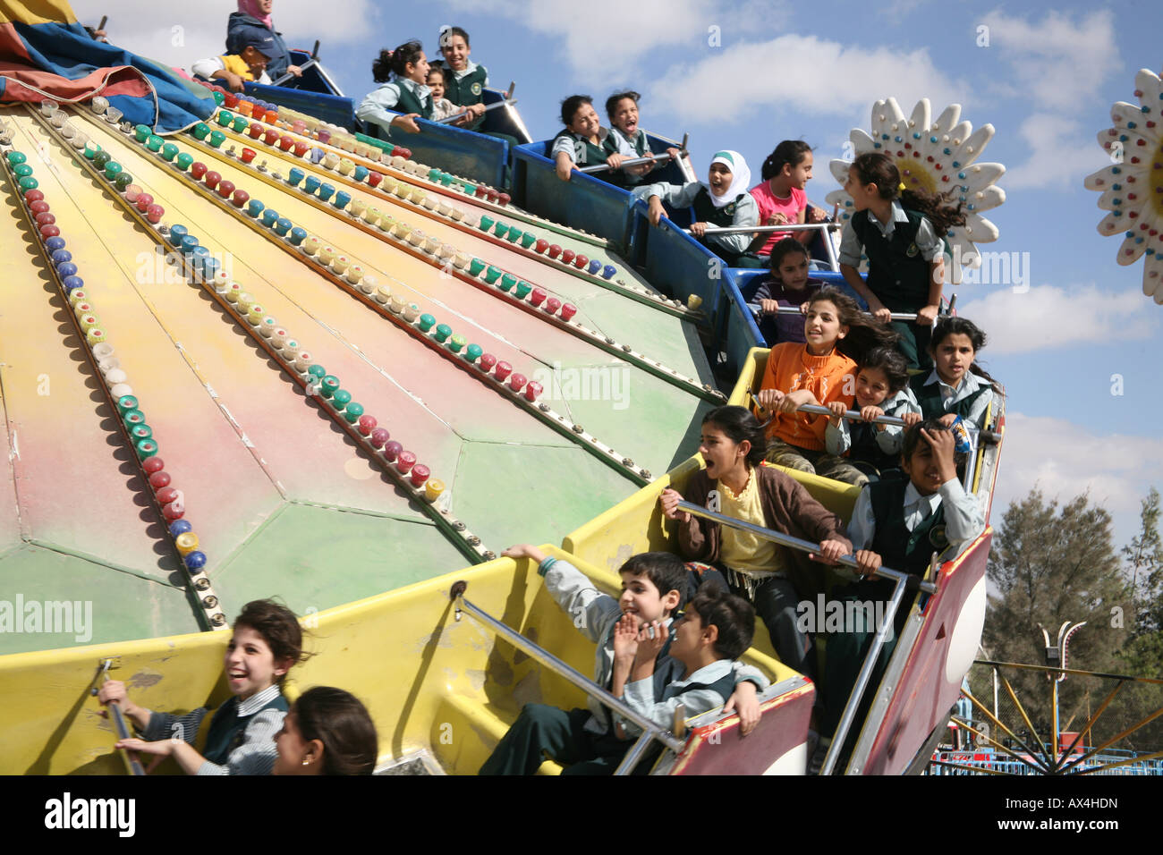 children playing at fair in Amman, jordan Stock Photo - Alamy