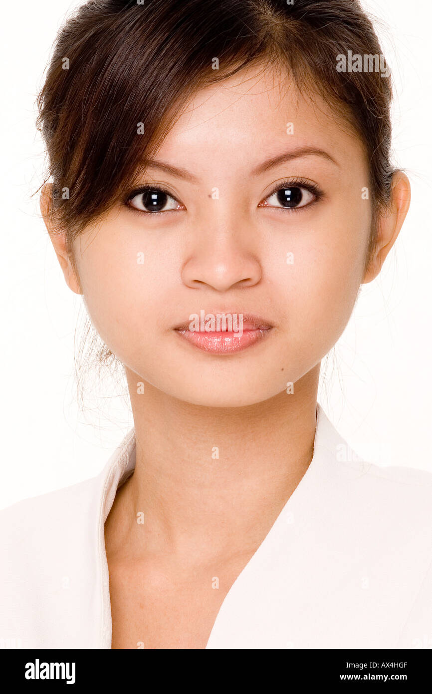 A cute asian woman in white on white background Stock Photo - Alamy