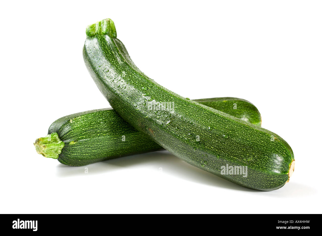 two zucchini isolated on white Stock Photo - Alamy