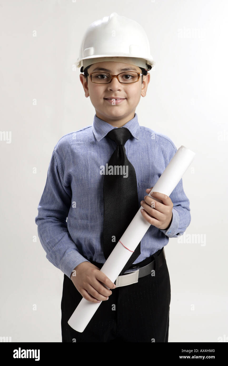 Portrait of a boy pretending like an architect Stock Photo - Alamy