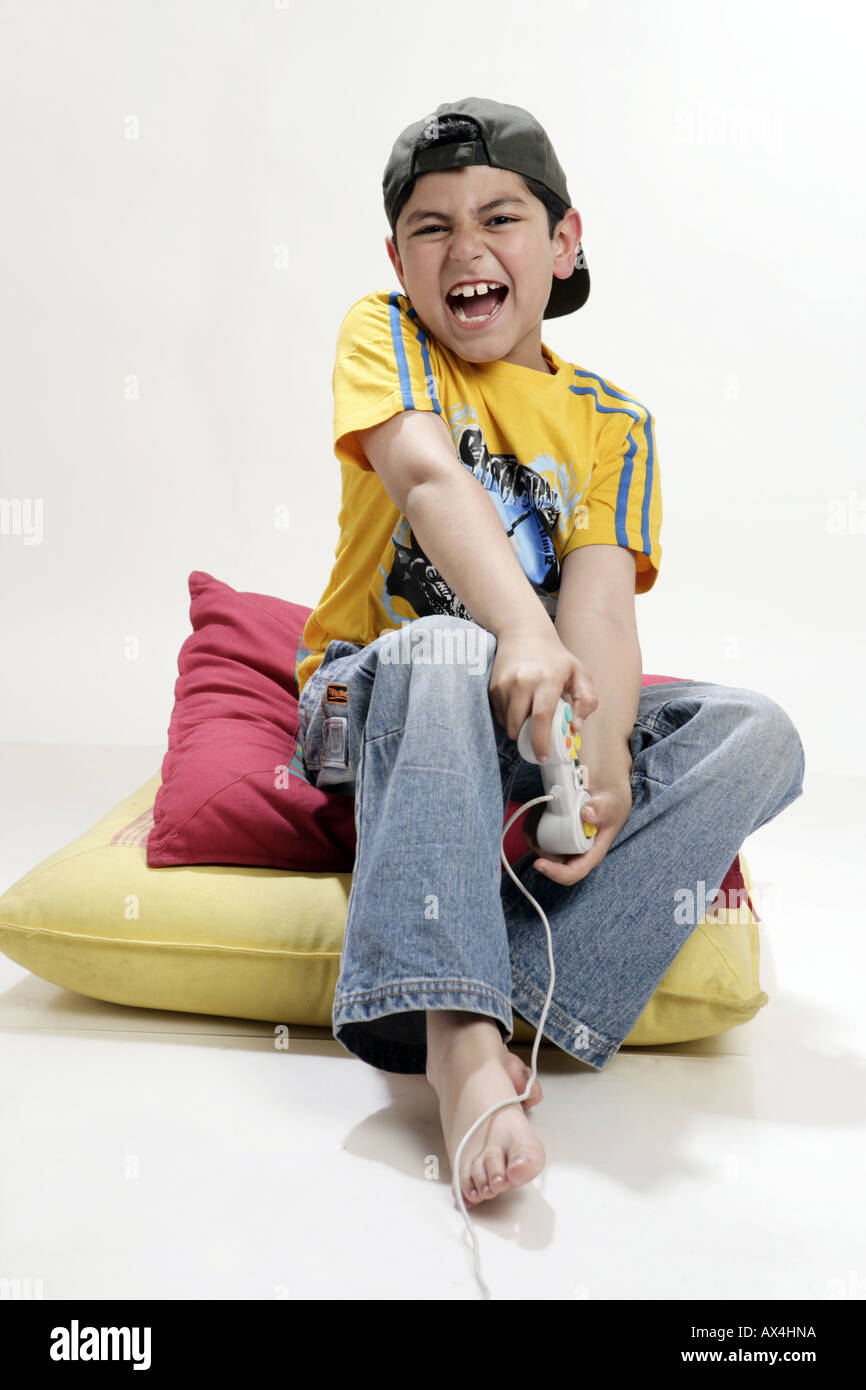 Asian kids playing video game hi-res stock photography and images - Alamy