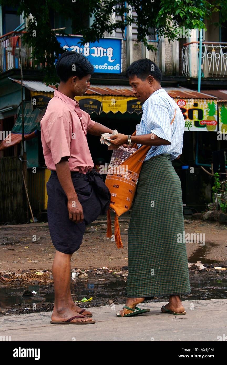 Men with traditional longyi clothes Stock Photo - Alamy