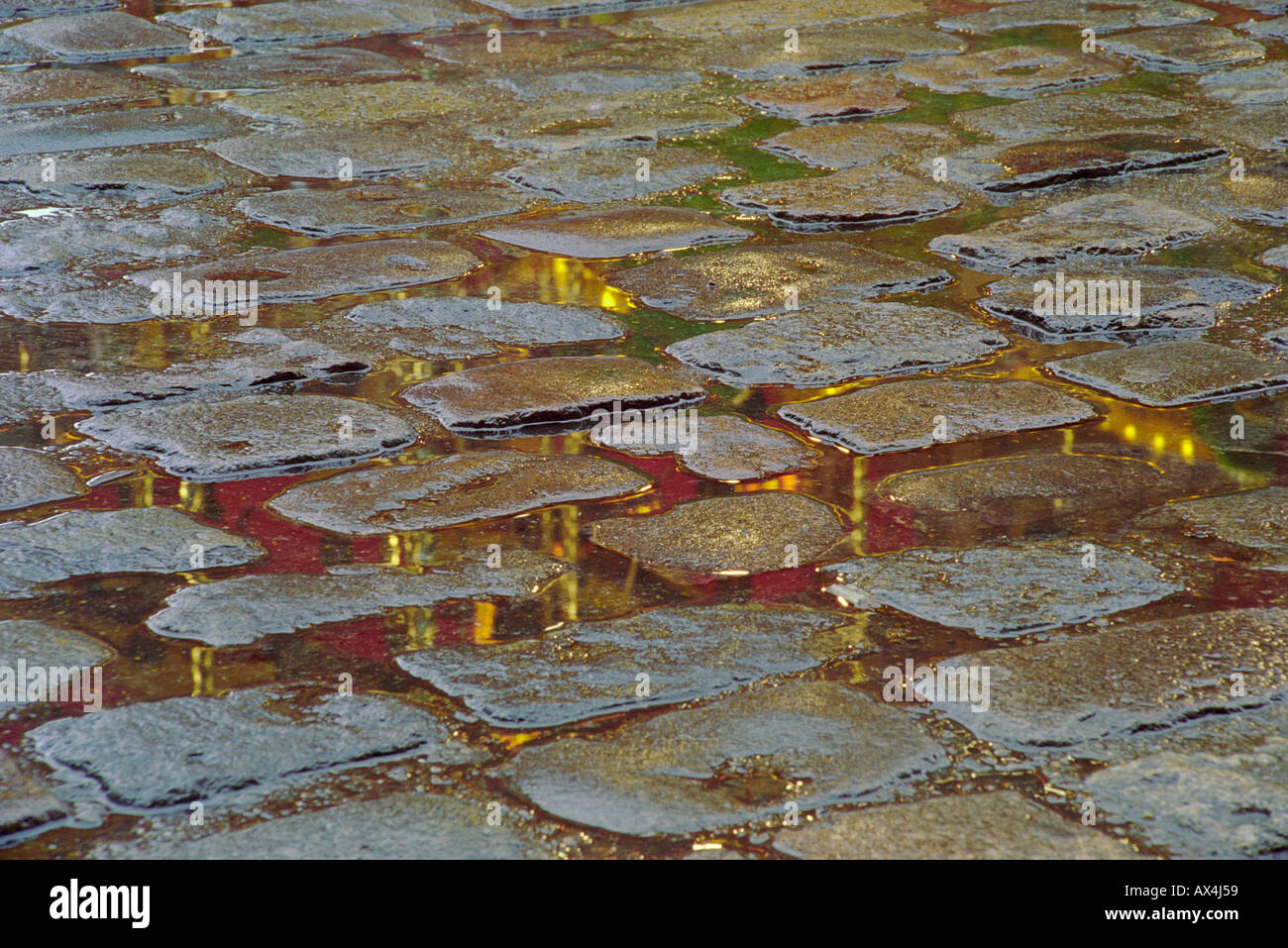 Wet cobbled street hi-res stock photography and images - Alamy