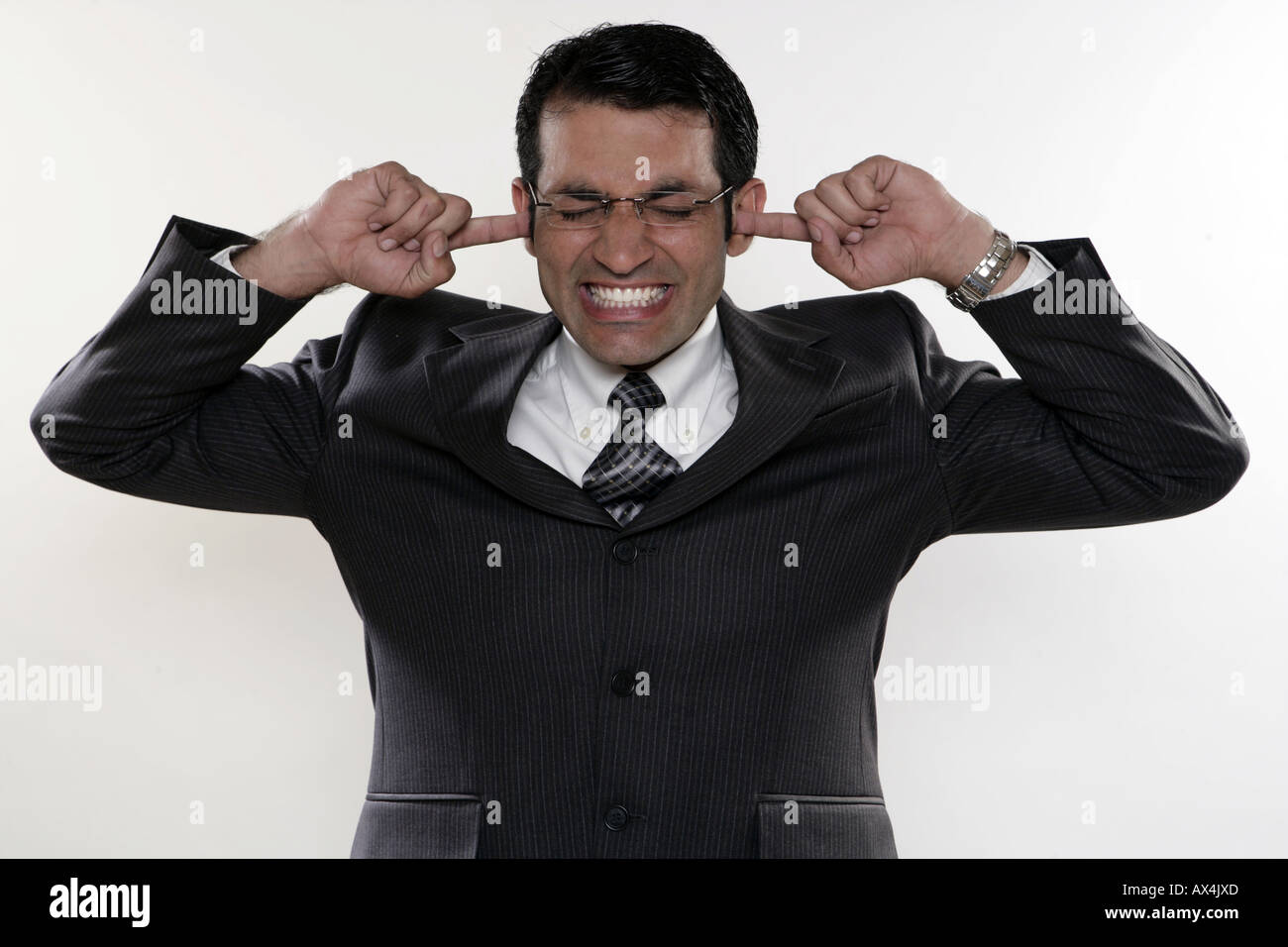 businessman looking irritated Stock Photo - Alamy