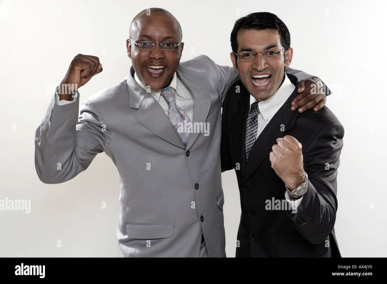 Portrait of two business partner cheering their success Stock Photo - Alamy