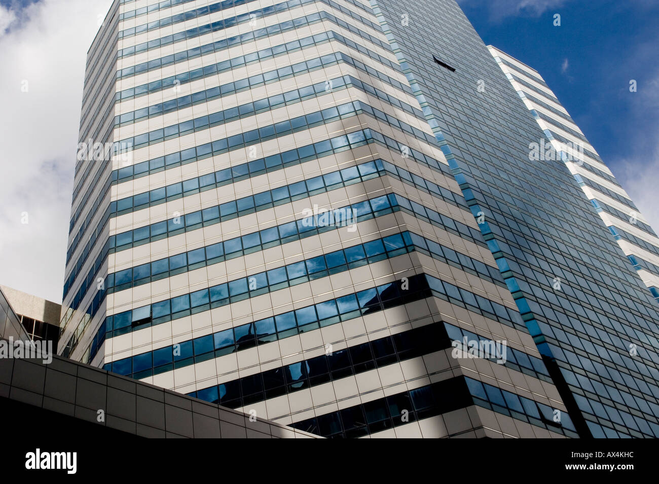 A single window is open in a tall glass skyscraper in Singapore Stock ...