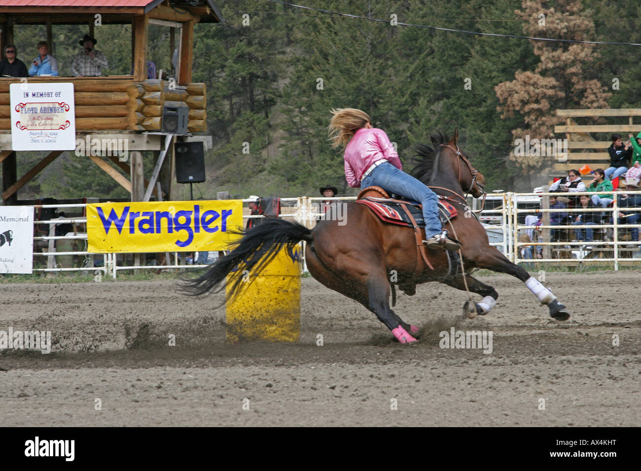 Barrel racing at a rodeo Stock Photo - Alamy