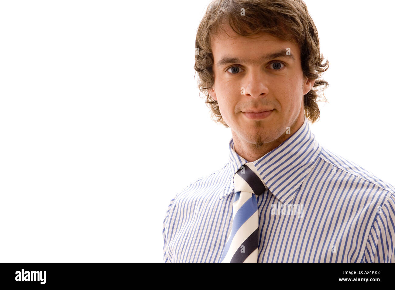 A handsome young businessman on white background Stock Photo - Alamy