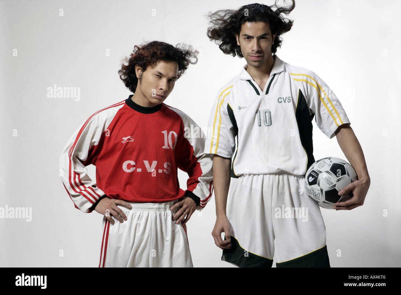 Two player playing football Stock Photo - Alamy