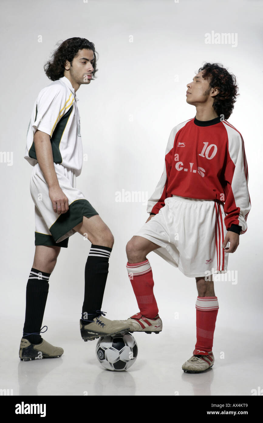 Two player playing football Stock Photo - Alamy