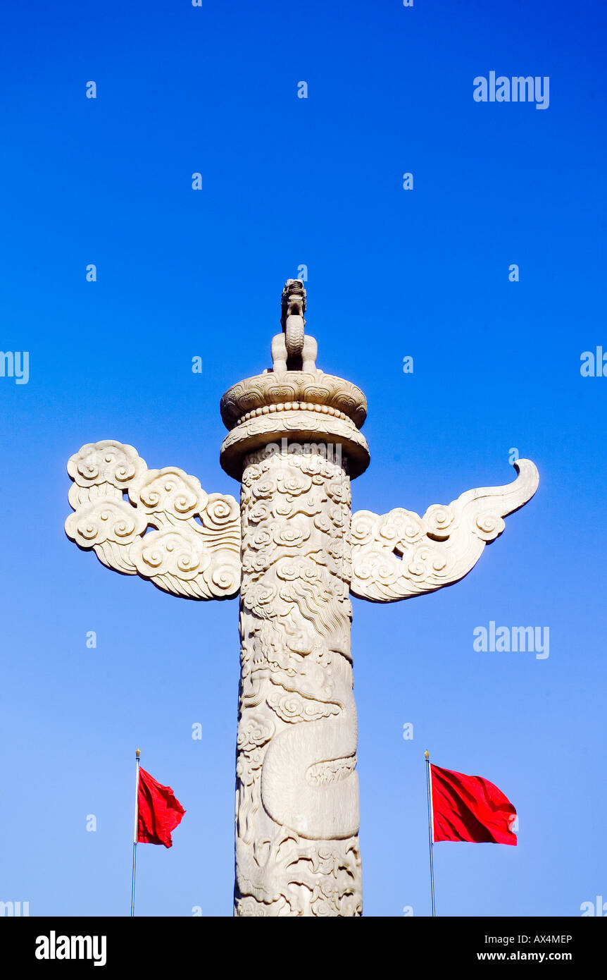 white engraved pillar and two red flags in Tiananmen Square Stock Photo ...