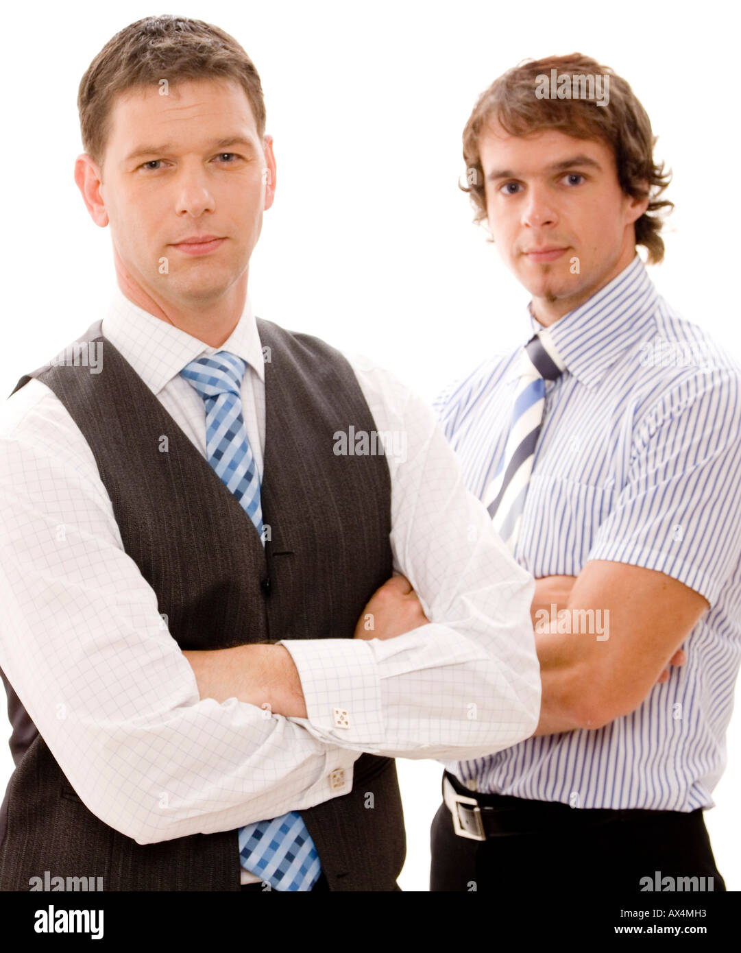 Two serious looking businessmen shallow depth of field used Stock Photo ...