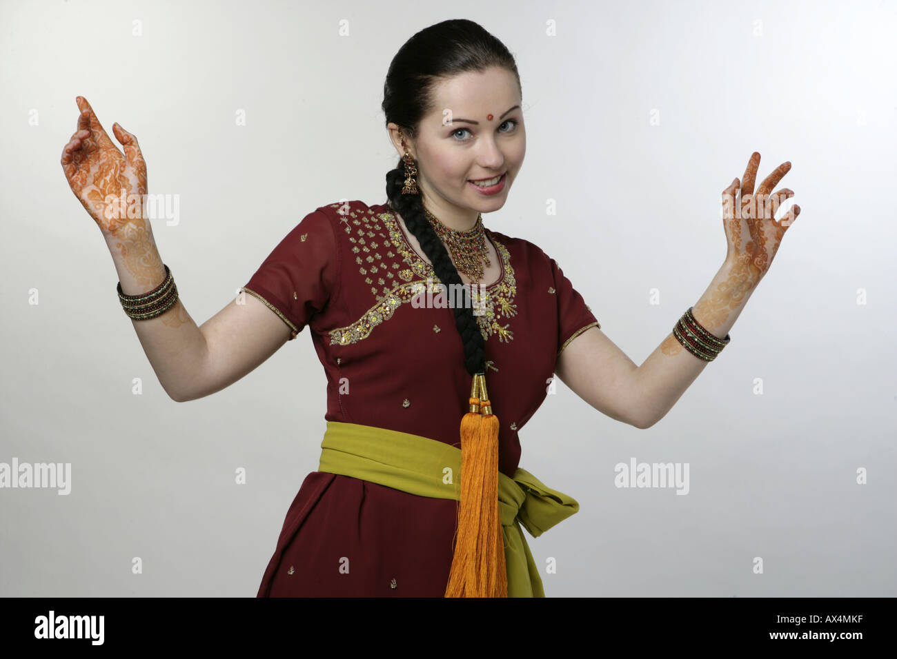 Portrait of a young woman dancing Stock Photo - Alamy