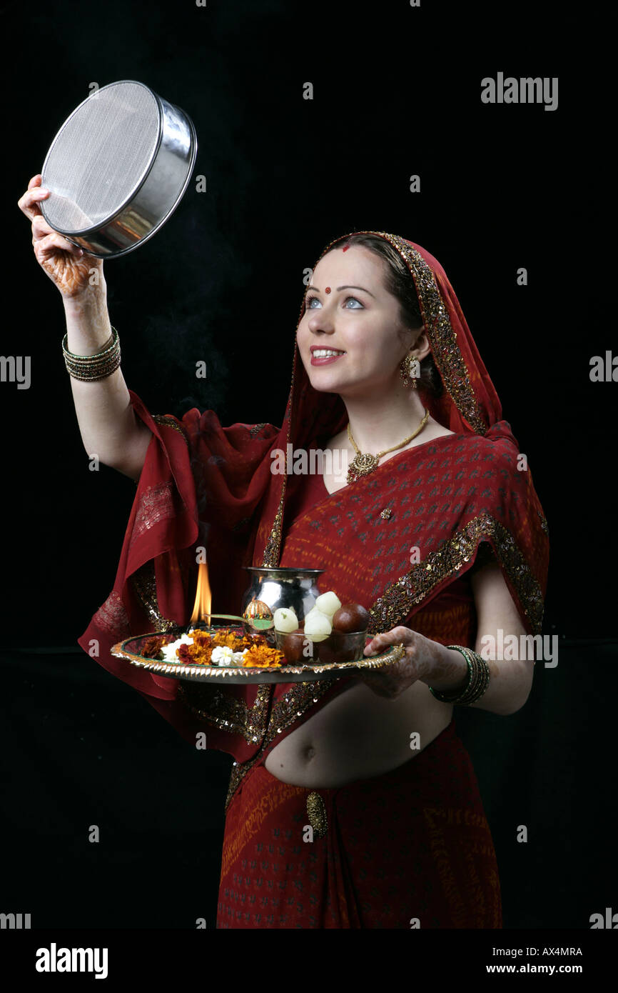 Woman celebrating karva chauth Stock Photo - Alamy