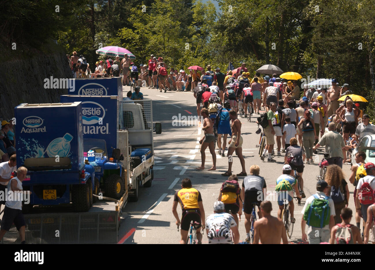 Amateur cyclists riding up the famous Alp D'Huez mountain before the ...