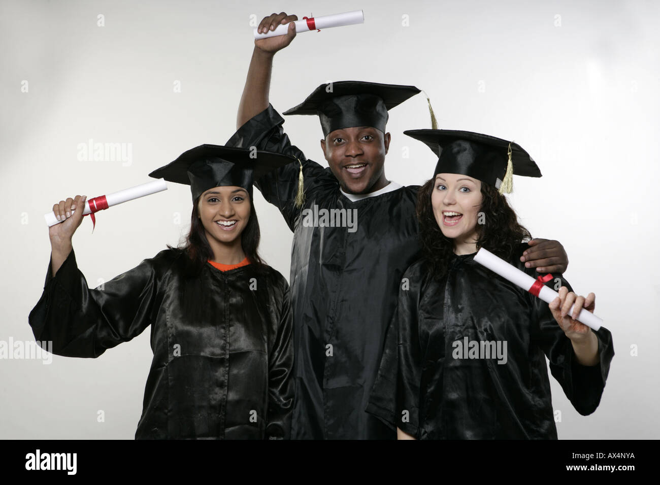 Portrait of three college students celebrating their success Stock ...
