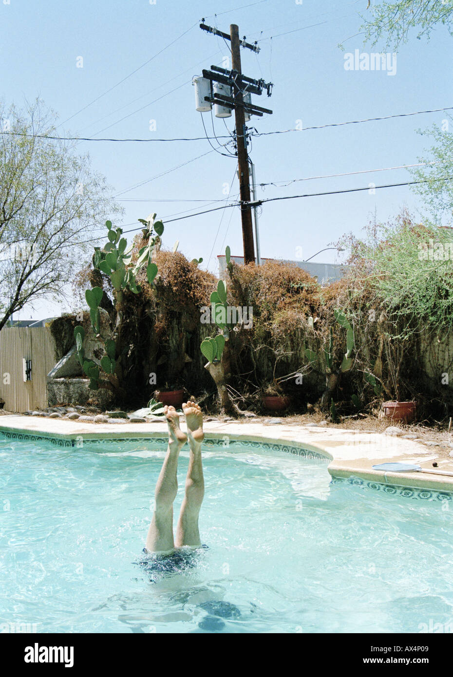 Handstand diving hi-res stock photography and images - Alamy