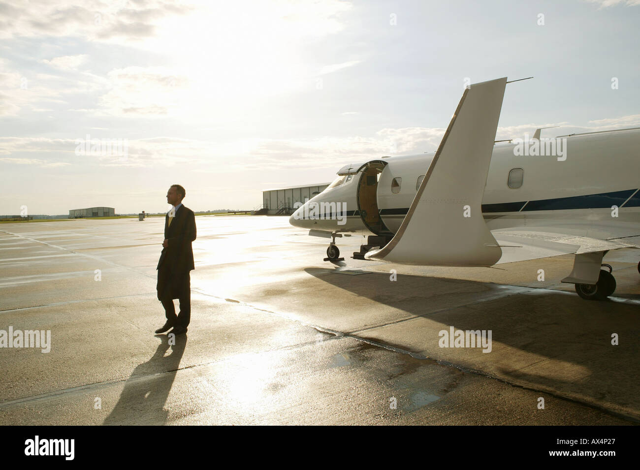 Businessman airplane tarmac hi-res stock photography and images - Alamy