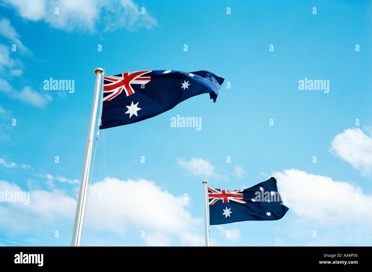 Two Australian flags blowing in the breeze Stock Photo - Alamy