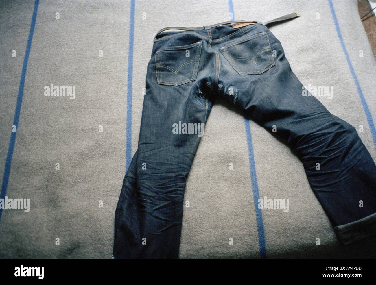Worn pair of jeans hi-res stock photography and images - Alamy