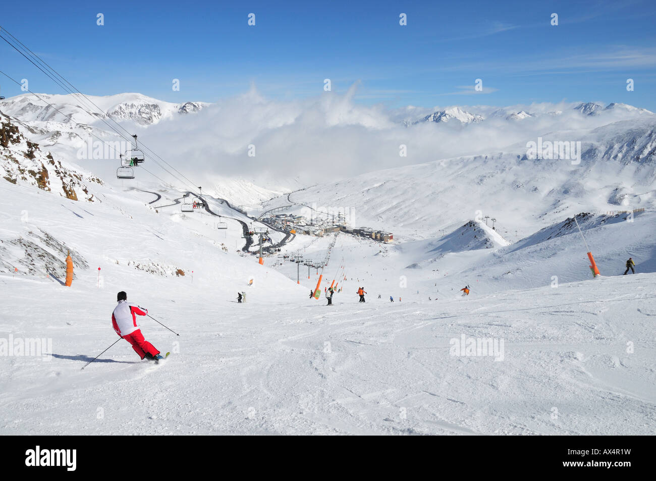 A broad view from the ski slope on to the popular Pas de la Casa skiing ...
