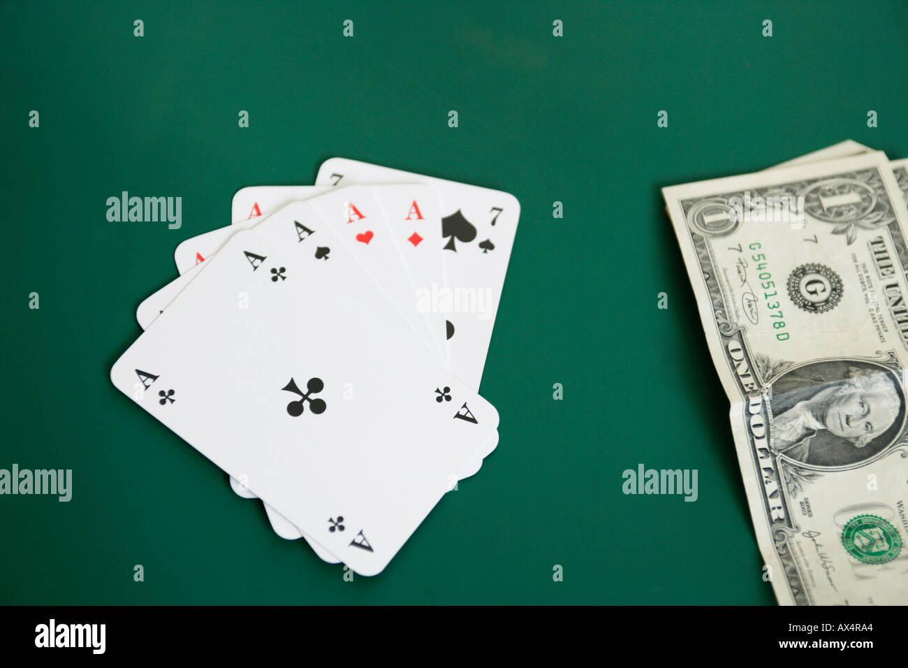 Playing cards and dollar bills Stock Photo - Alamy