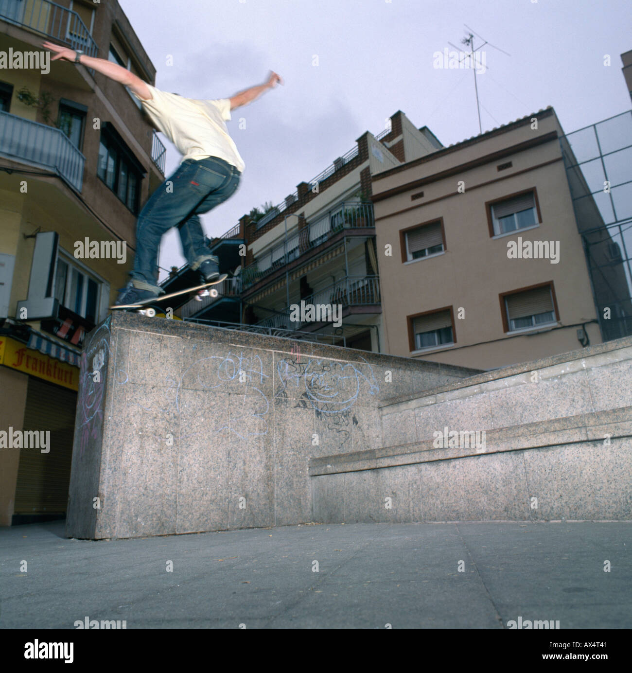 Man jumping over steps on skateboard Stock Photo - Alamy