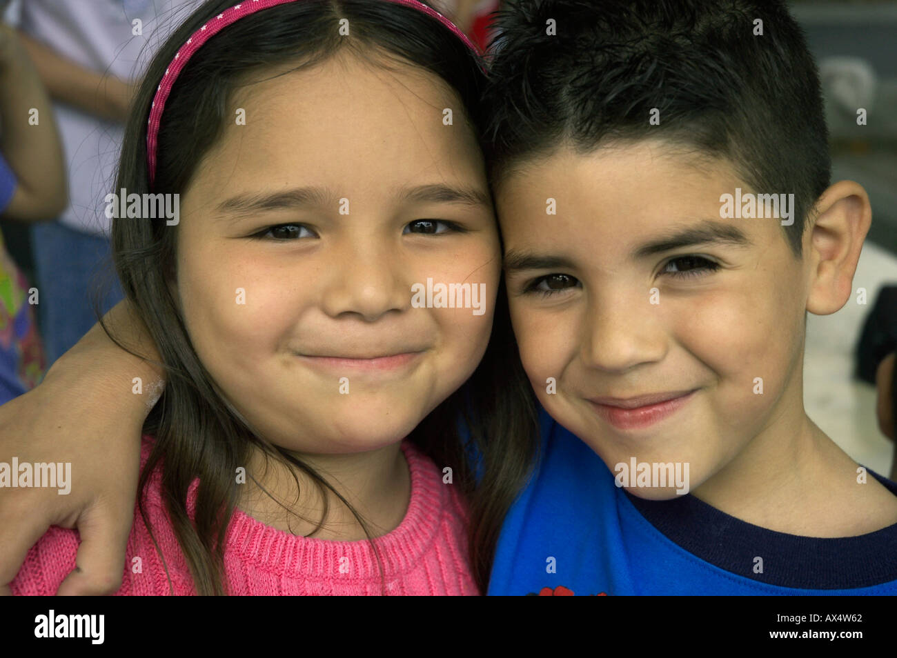 Hispanic Kids Hug Friends High Resolution Stock Photography and Images ...