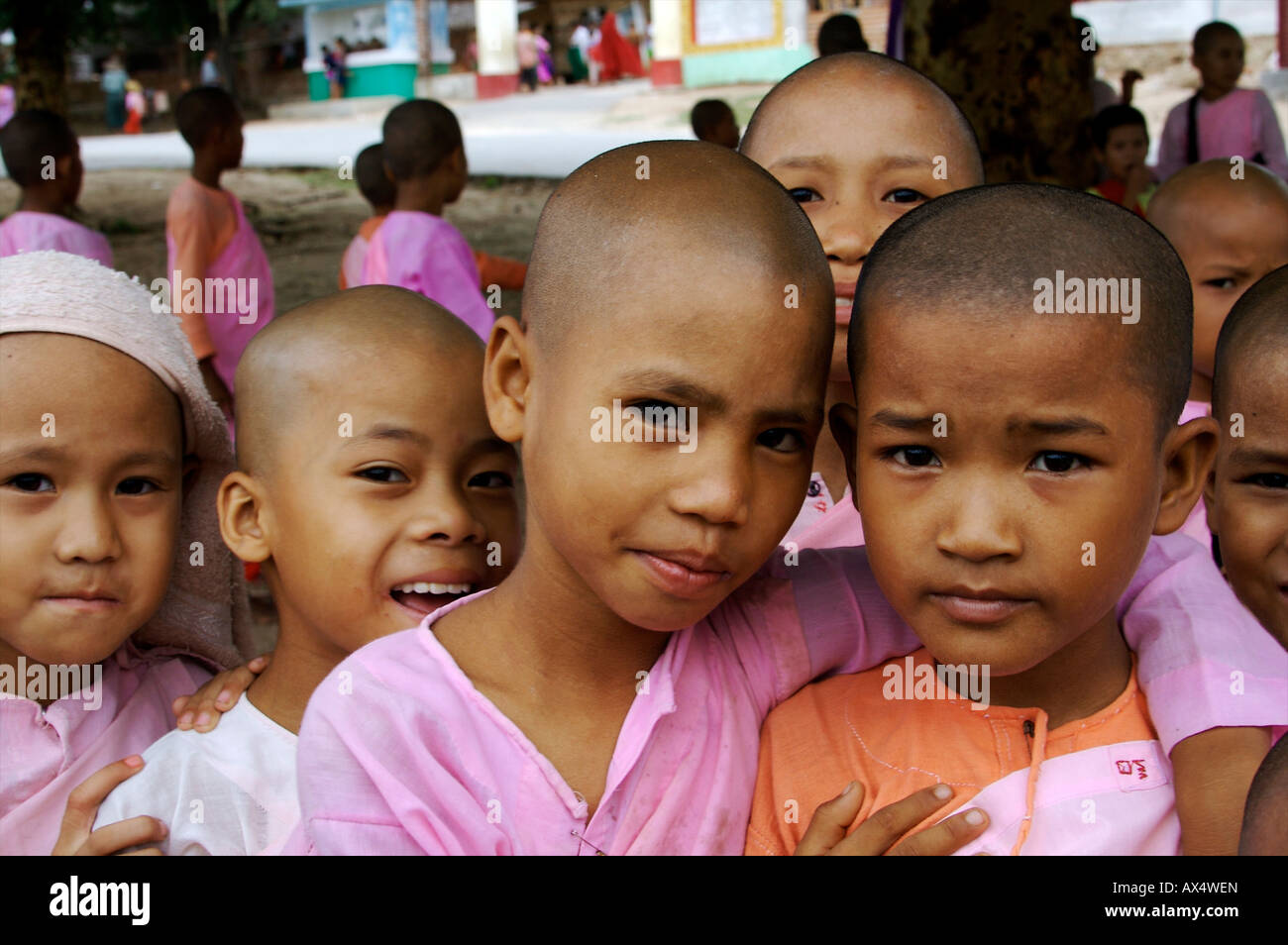 Young nuns playing outsite Sagaing Monastery Stock Photo - Alamy