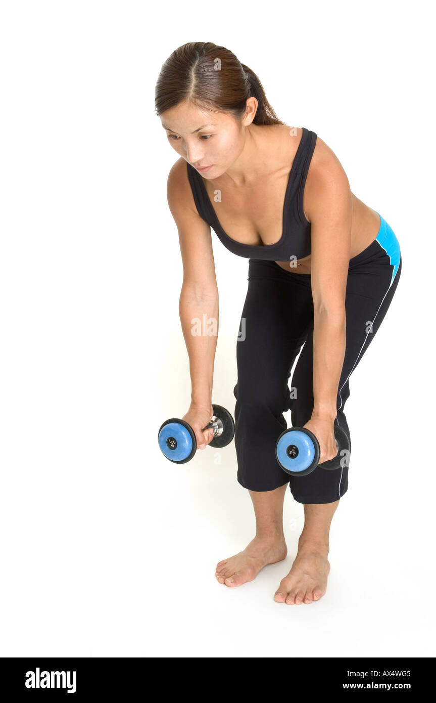 A female fitness instructor demonstrates the starting position for bent ...