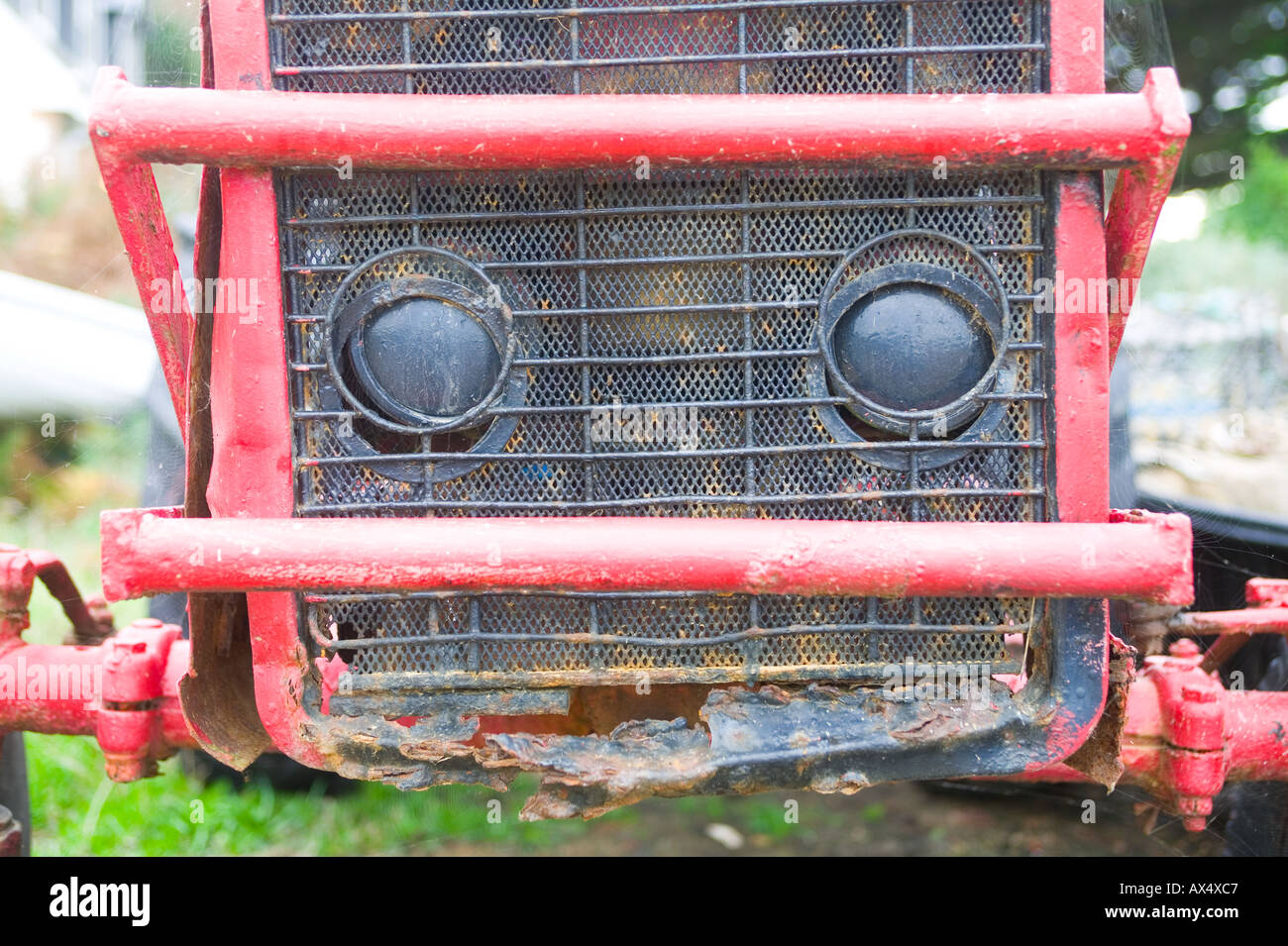 Front of old tractor looking like human face Stock Photo - Alamy