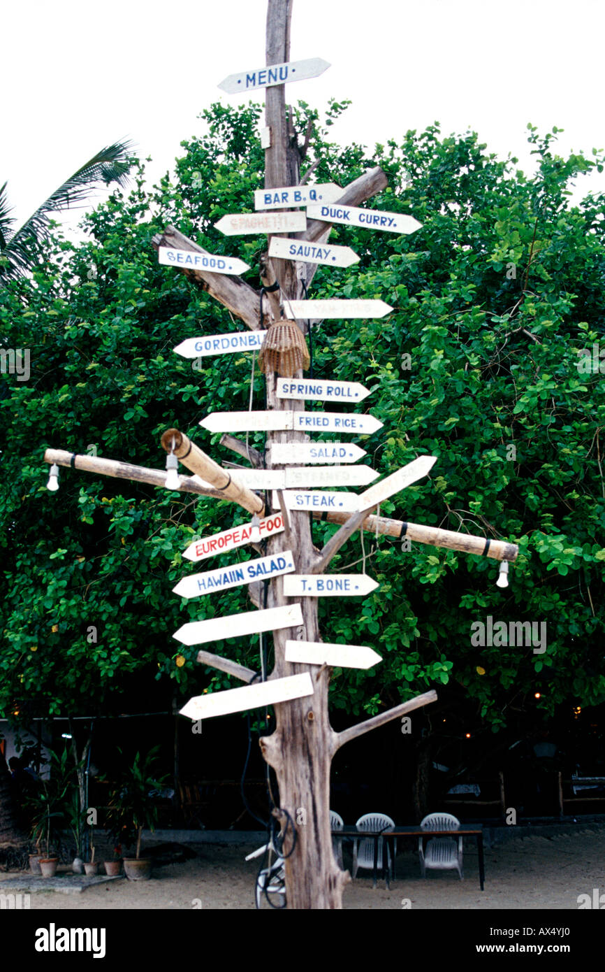 Pole with direction signs for various kinds of food cooking in Ko Samui ...