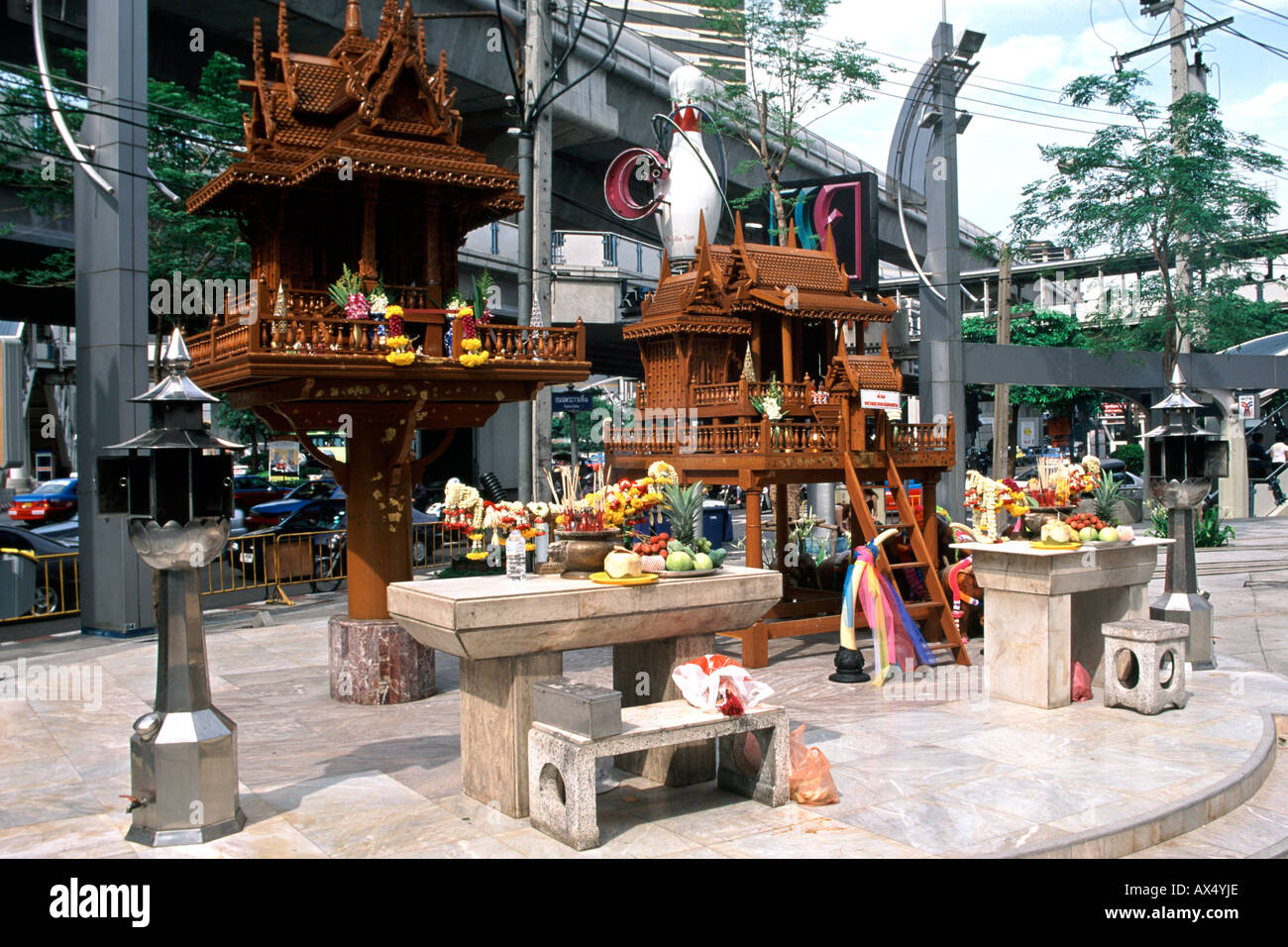 Buddhist shrine with variety of offerings in Bangkok Thailand Stock ...