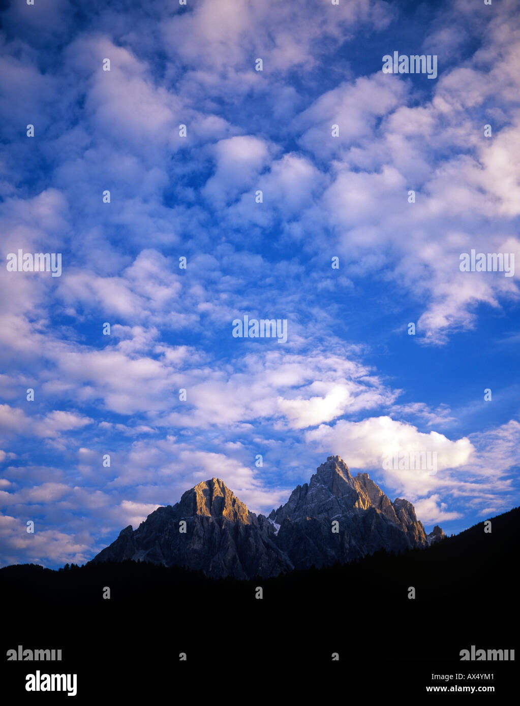 Sunset on mountain tops in the dolomite alps Stock Photo - Alamy