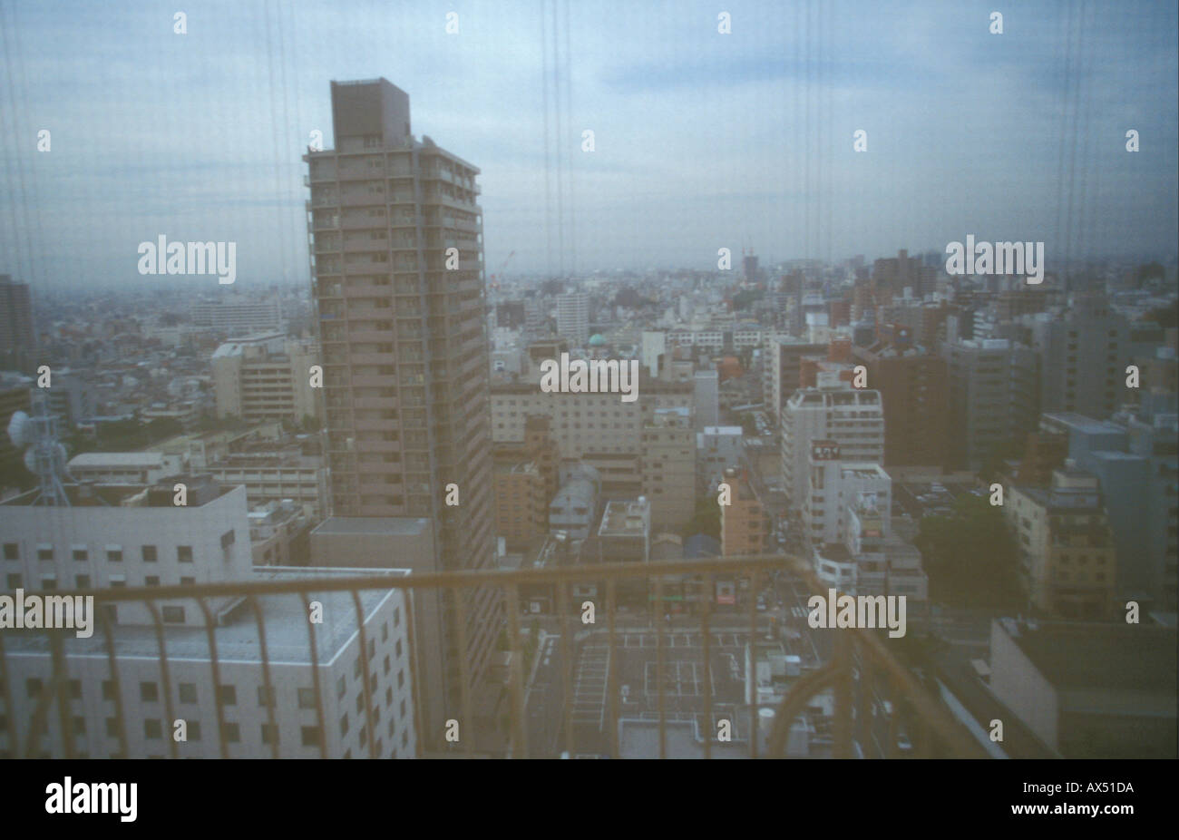 Expansive Osaka Japan is seen through a hotel window Stock Photo - Alamy