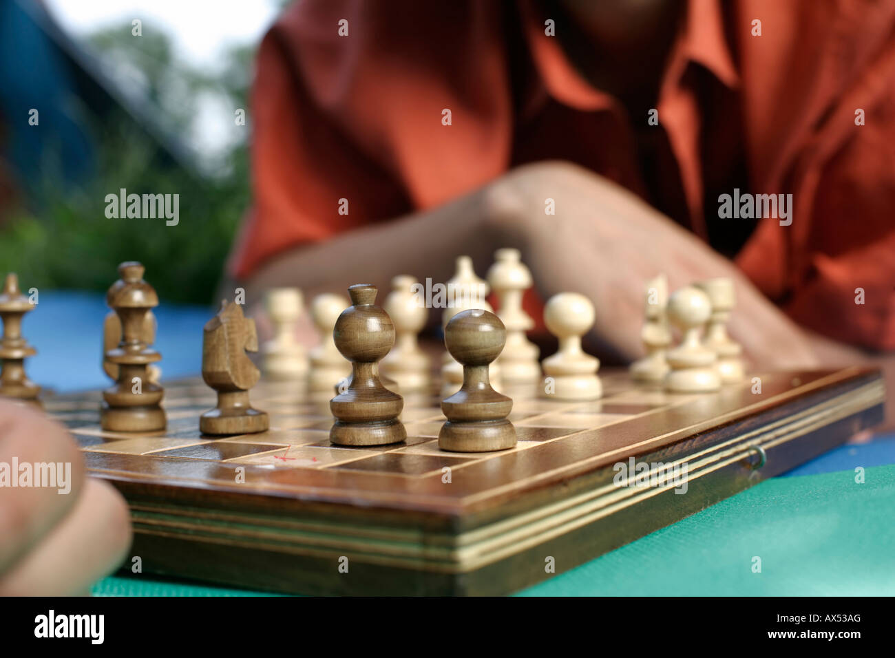Two young men are playing chess, close-up Stock Photo - Alamy
