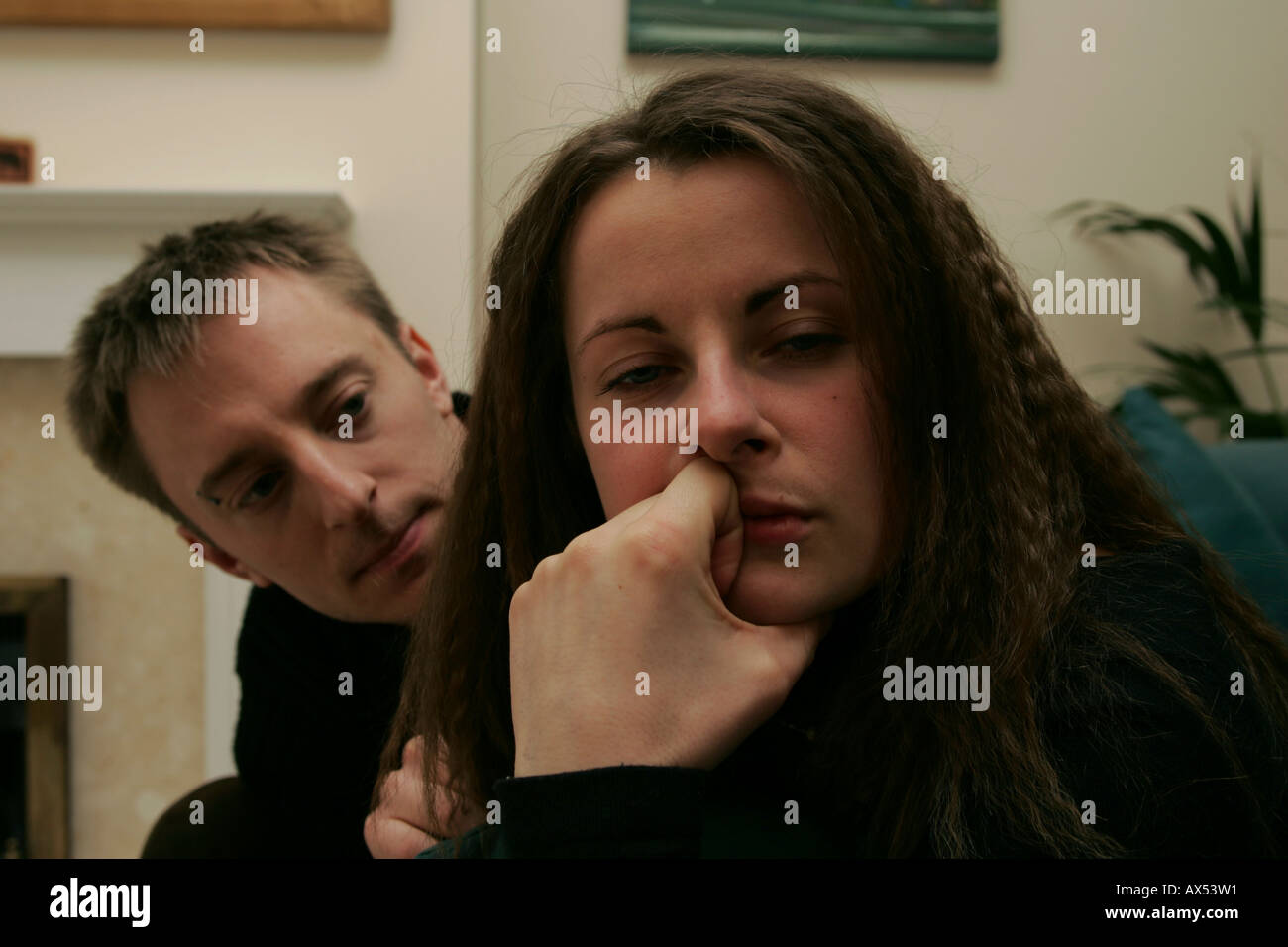 depressed man with girlfriend Stock Photo - Alamy