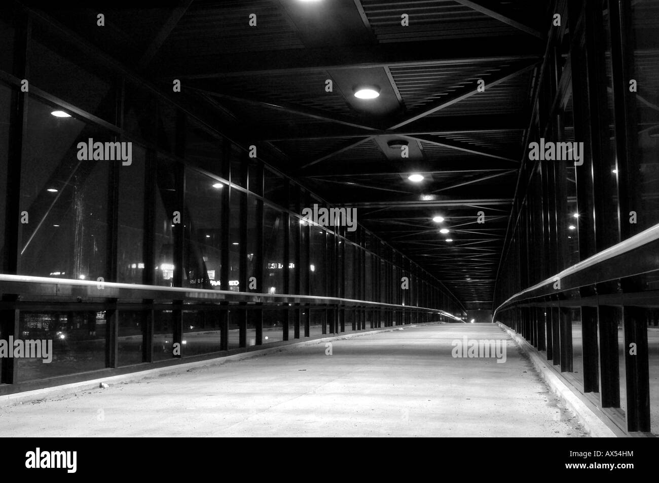 A dark creepy pedestrian bridge at night Stock Photo - Alamy
