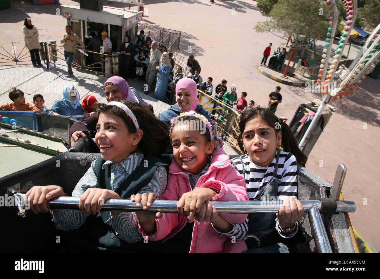 school children playing at fair in Amman, jordan Stock Photo - Alamy