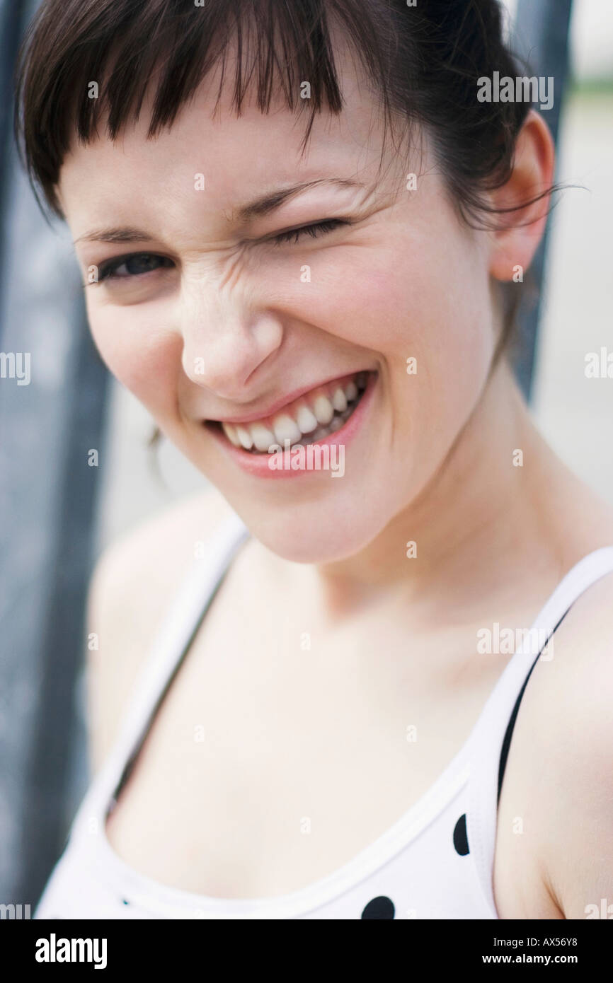 Close up woman winking eye hi-res stock photography and images - Alamy