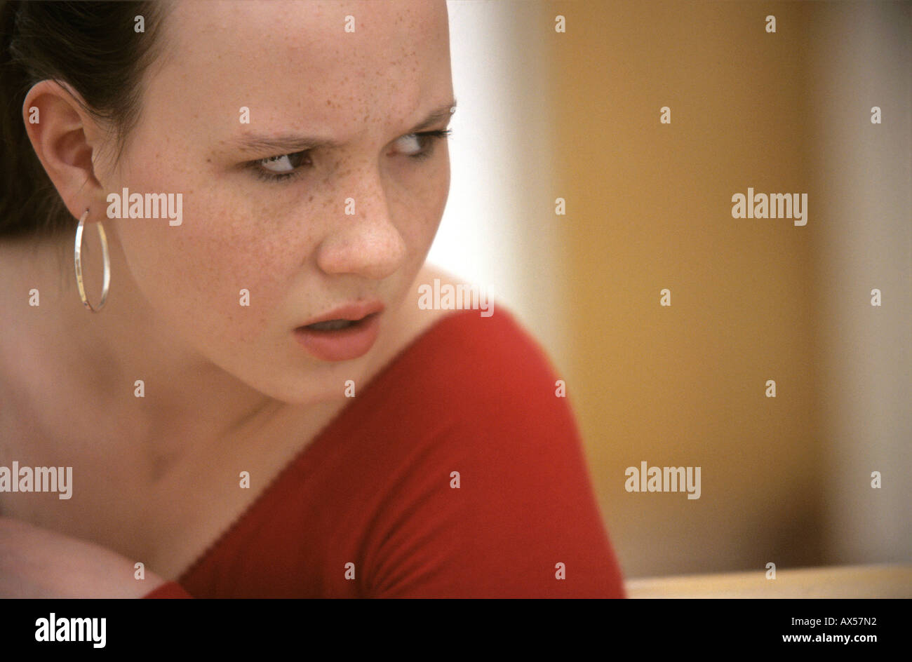 Young girl wearing red top, portrait Stock Photo - Alamy