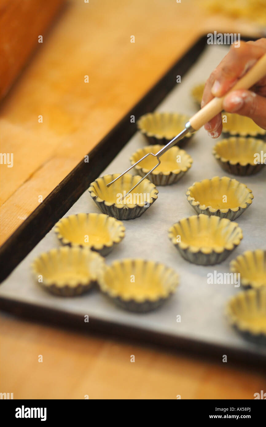 Pastry chef making mini tarts Stock Photo - Alamy